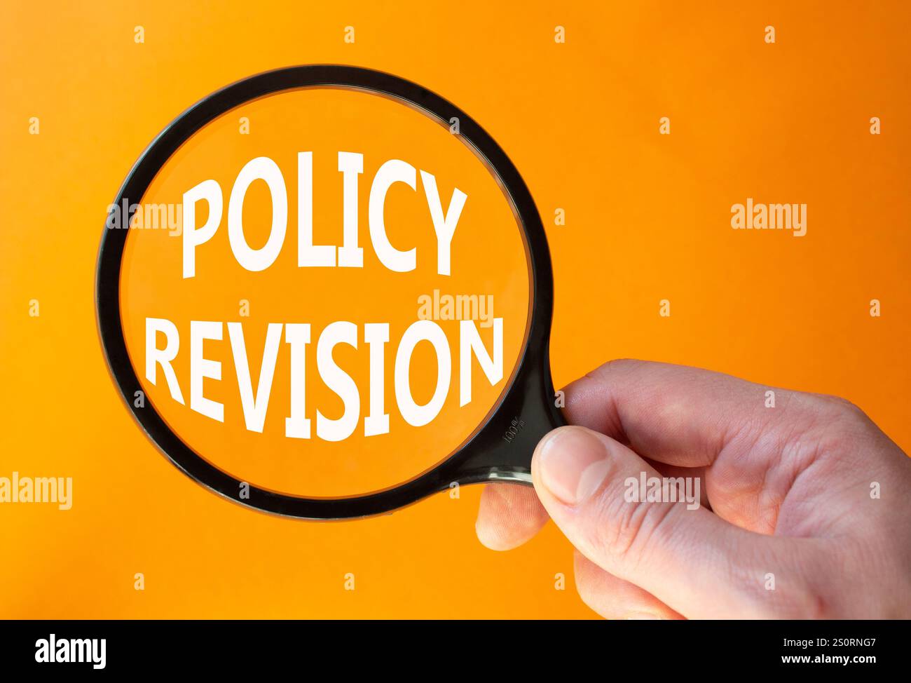 Policy revision symbol. Concept word Policy revision on magnifying ...