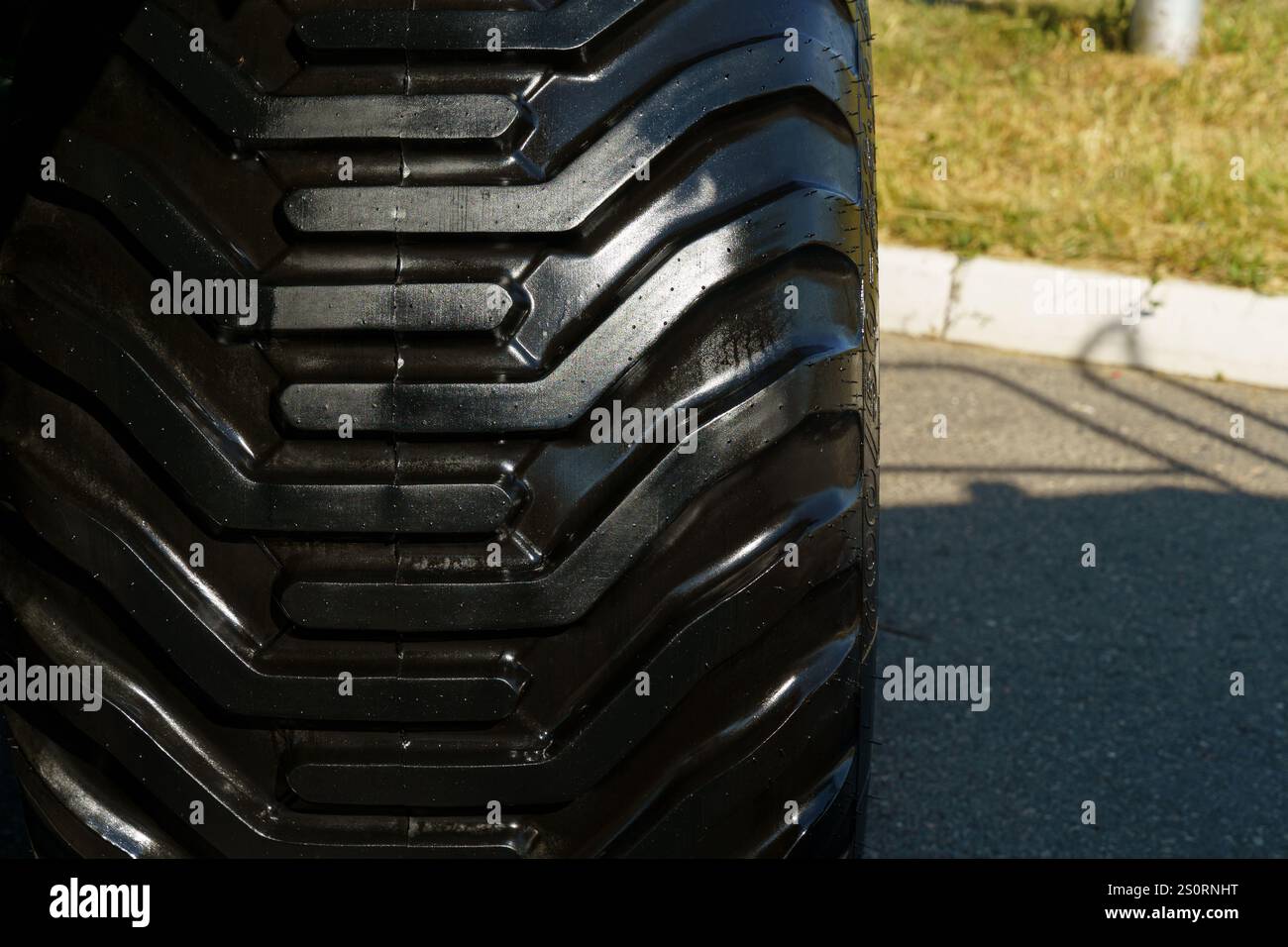 A detailed view of a tire tread reveals its unique design, showcasing ...