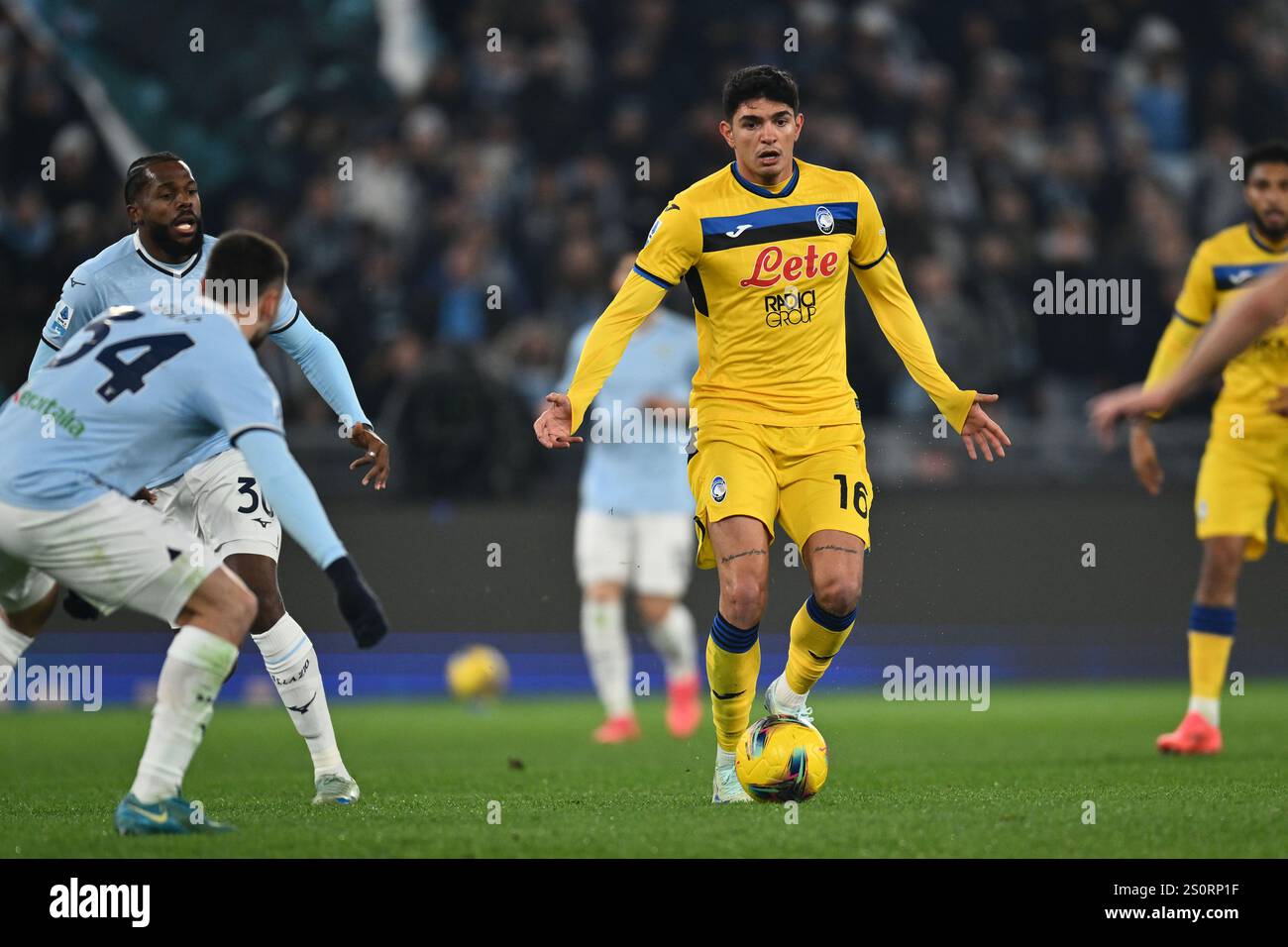 Rome, Italy. 28th Dec 2024. Raoul Bellanova (Atalanta) Nuno Tavares ...