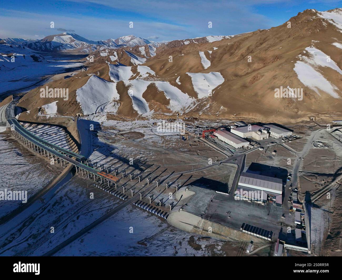 Urumqi. 25th Dec, 2024. An aerial drone photo shows the exit of ...