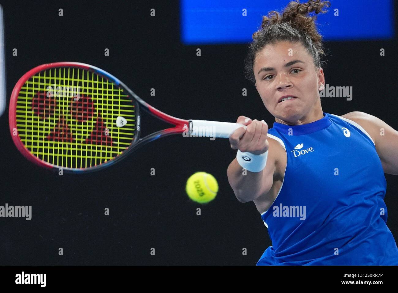 Italy's Jasmine Paoliniplays a forehand return to Switzerland's Belinda ...