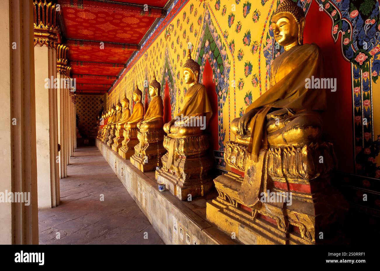 Roaws of golden sitting buddhas at Wat Arun Ratchawararam ...