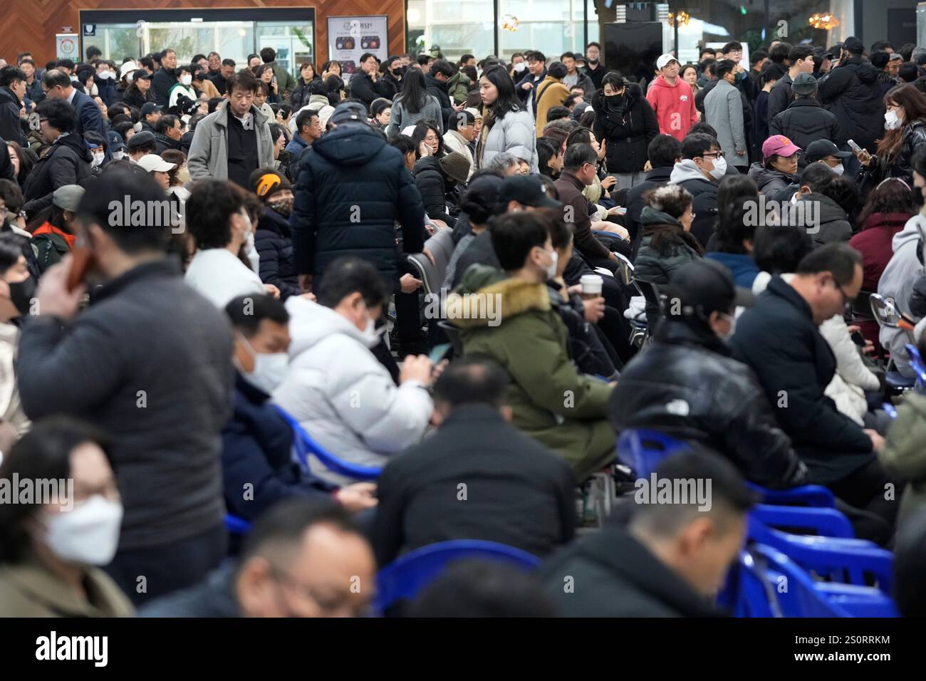 Relatives of passengers gather at Muan International Airport in Muan ...