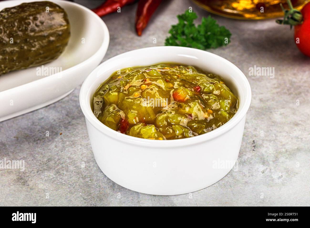 Souce gherkin relish with marinated cucumbers and mustard Stock Photo ...