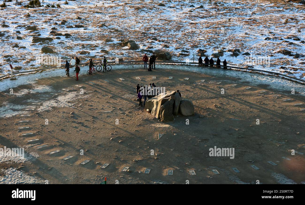 29 December 2024, Saxony-Anhalt, Schierke: Hikers stand on the Brocken ...