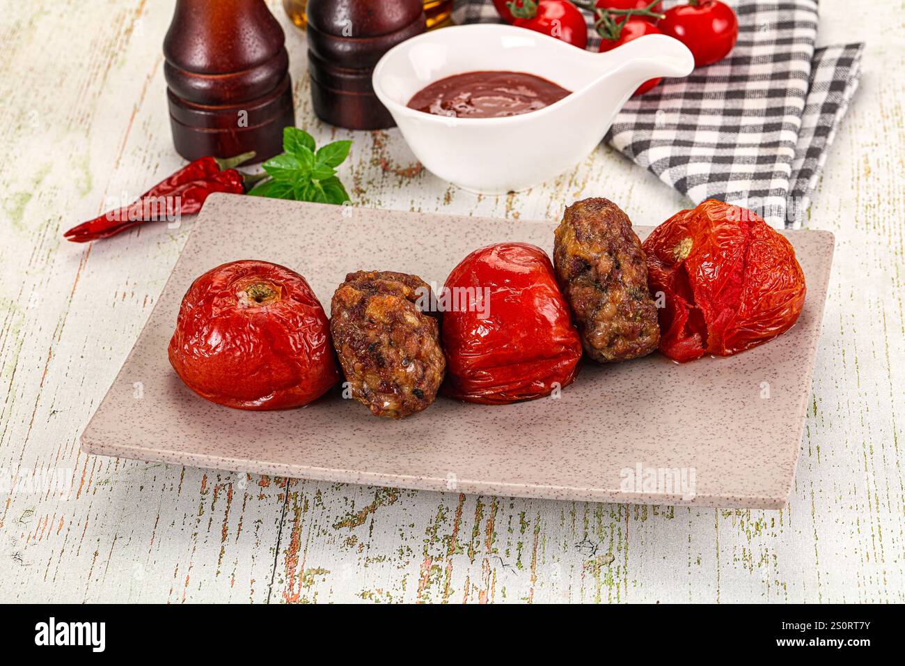 Turkish cuisine - Domatesli Kebab with minced meat and tomato Stock ...