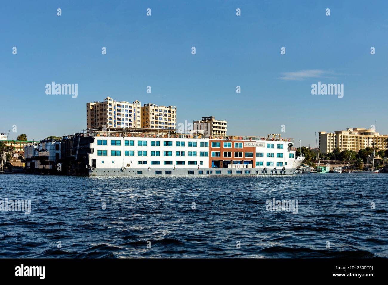 Aswan, Egypt; January 18, 2024: View of a Nile river cruise ship docked at the port of Aswan ...