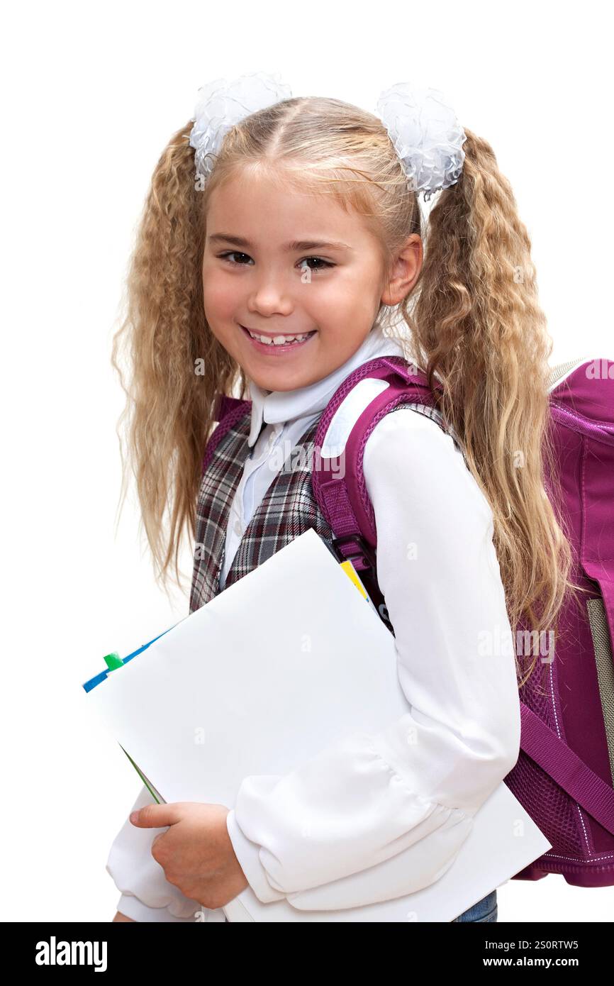 Elementary school age girl on a white background Stock Photo - Alamy