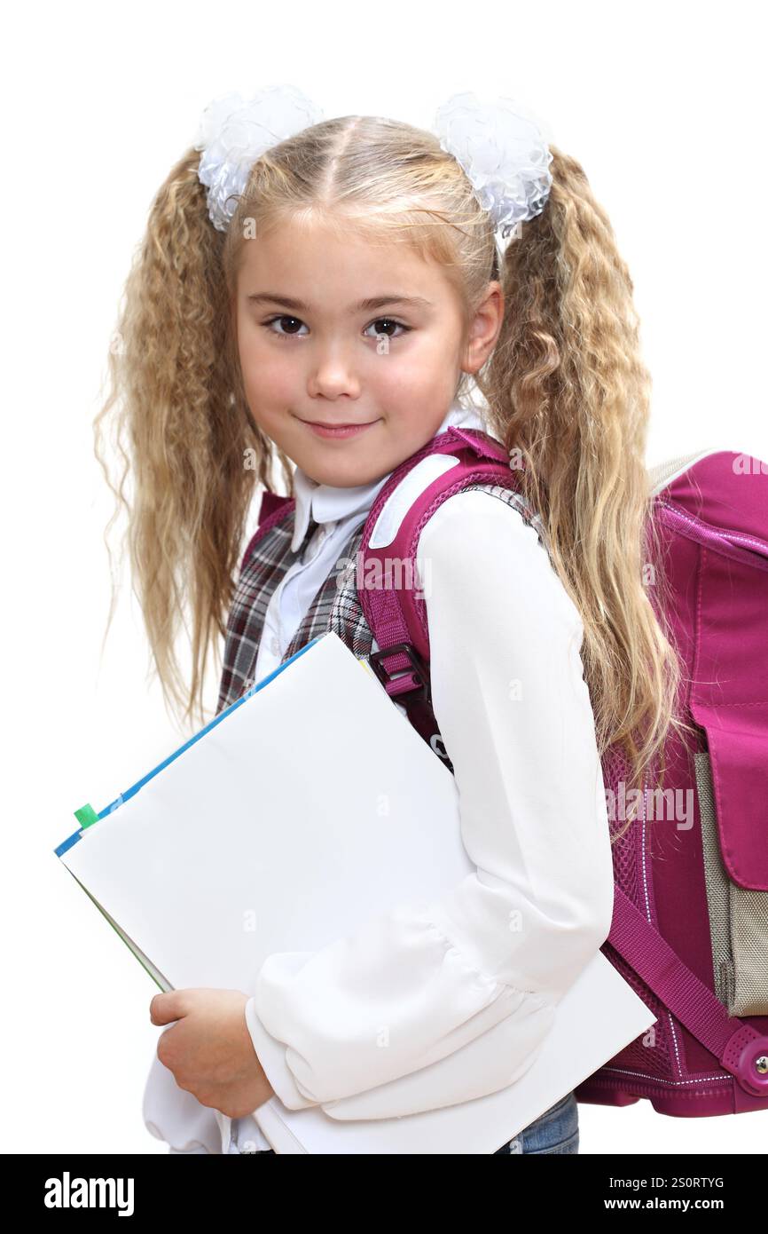 Elementary school age girl on a white background Stock Photo - Alamy