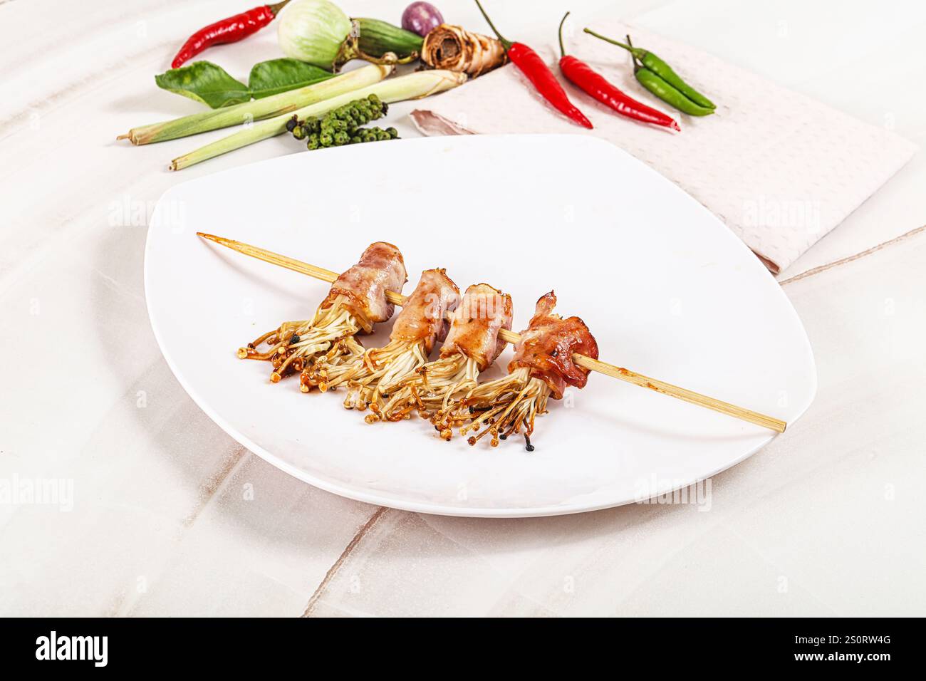 Thai Street foof satay with bacon and mushroom enoki skewer Stock Photo ...