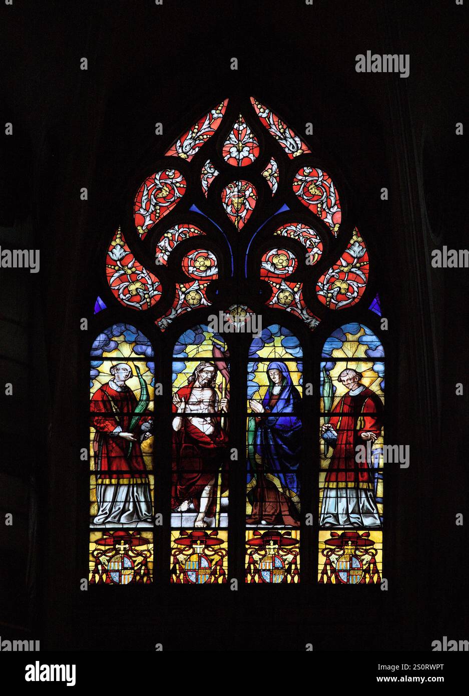 Stained glass window with vibrant colors and religious figures in ...
