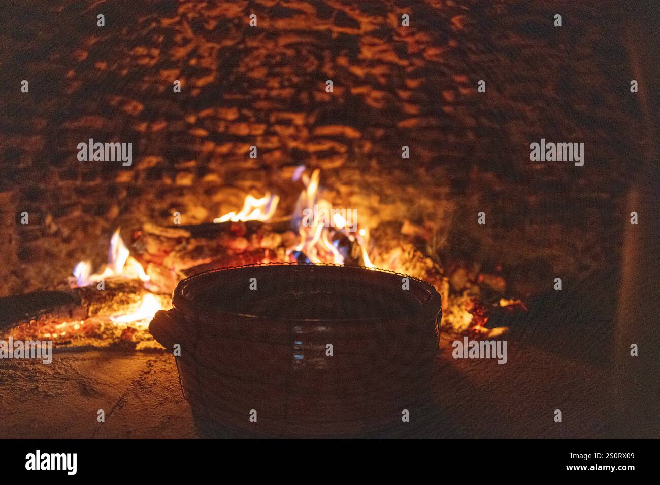 Clay Pot in a Wood-Fired Oven with Glowing Flames Stock Photo - Alamy