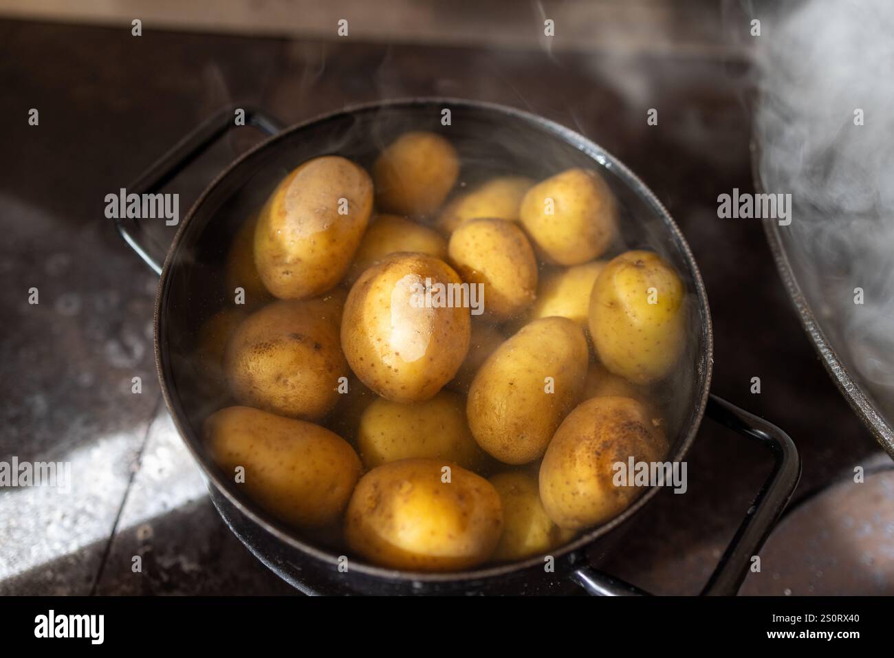 Hot boiling potatoes hi-res stock photography and images - Alamy