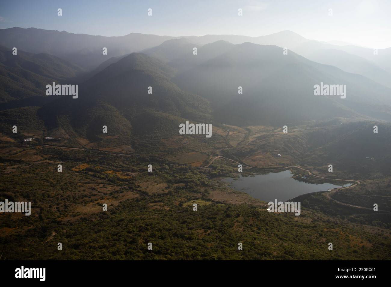 Water dam in Teotitlan del Valle facing the southern Sierra of Oaxaca ...