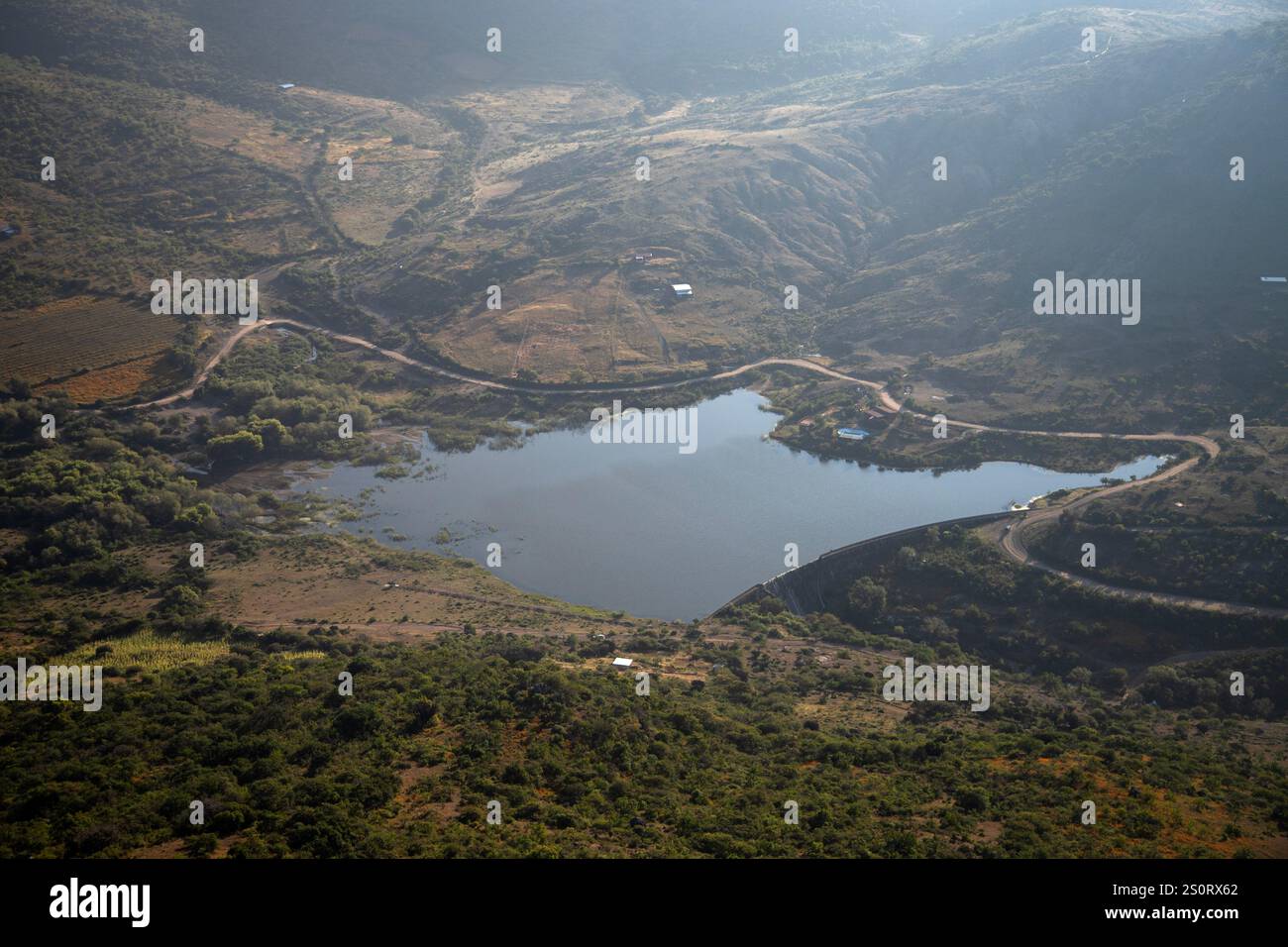 Water dam in Teotitlan del Valle facing the southern Sierra of Oaxaca ...