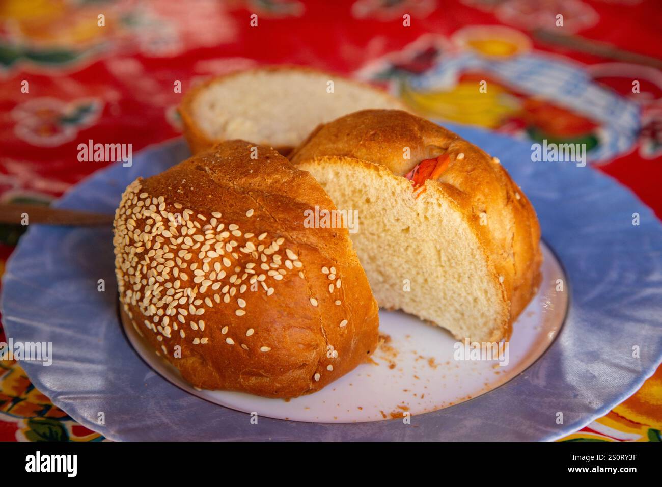 Oaxacan egg yolk bread decorated with alfeñique figures for the Day of ...