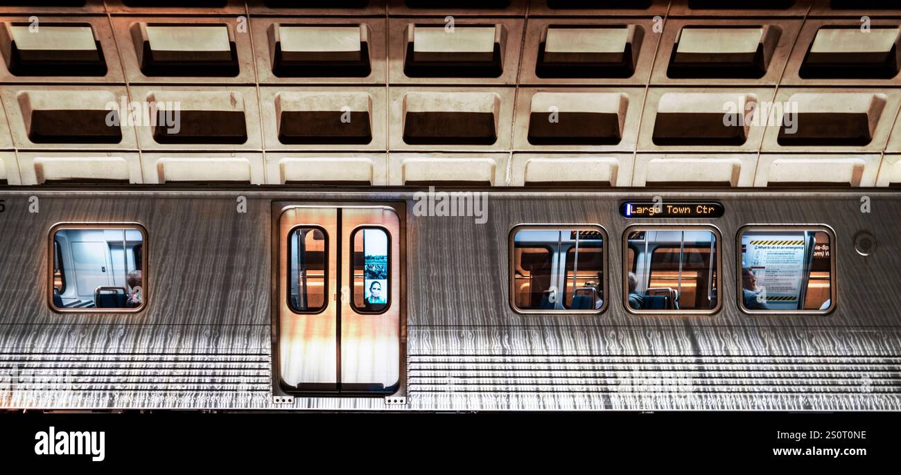 A close-up view of a subway train with a focus on the doors and windows ...