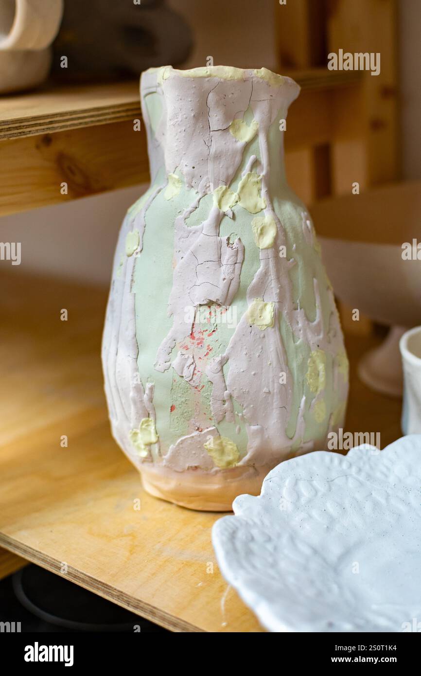 Samples of ceramic art objects and tabelware made on workshop in art ...