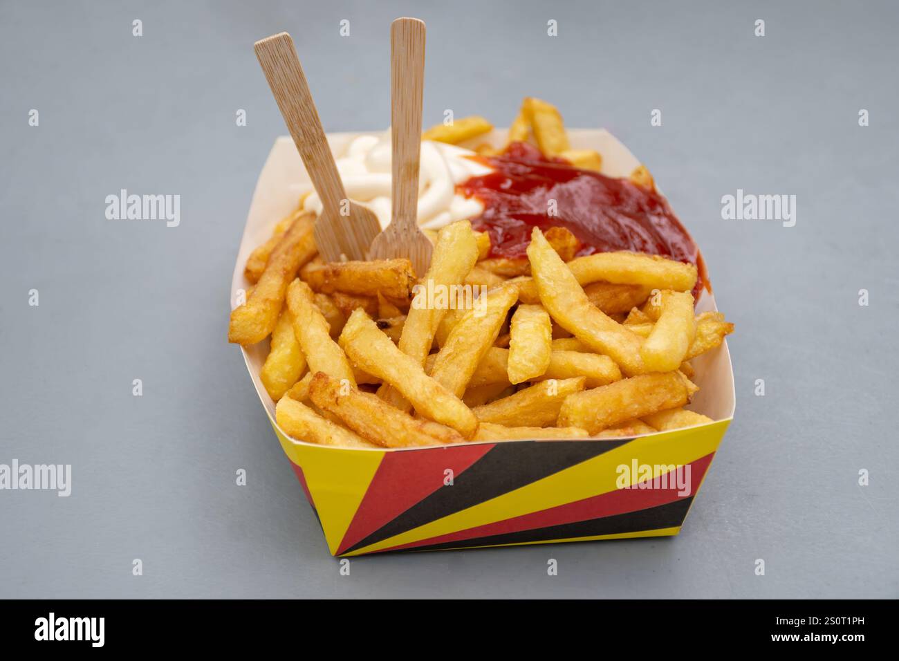 Belgian street and fast food, paper box in colors of Belgian flag with ...