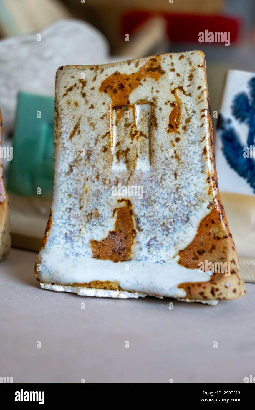 Samples of ceramic art objects and tabelware made on workshop in art ...