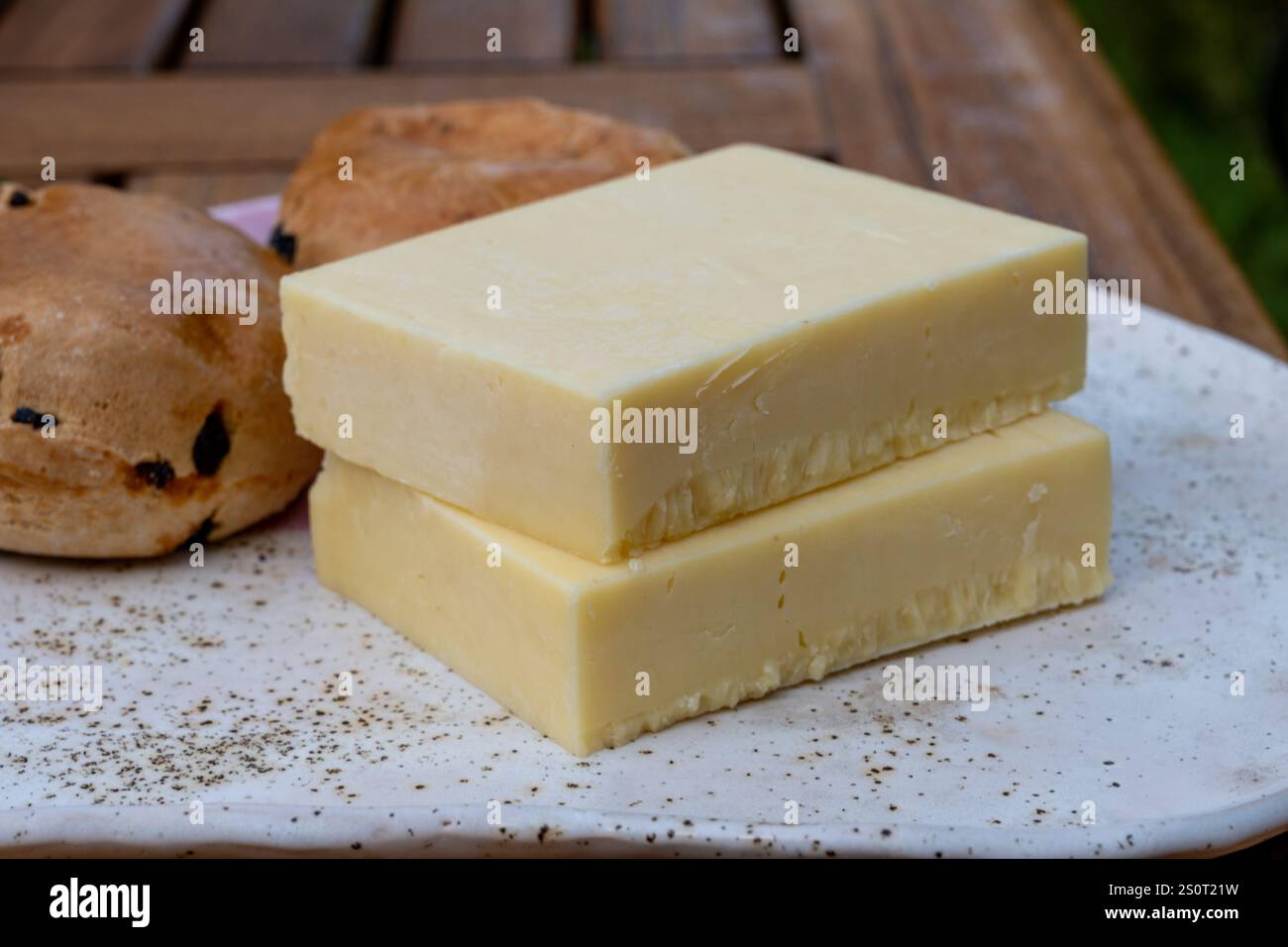 Block of aged cheddar cheese, the most popular type of cheese in United ...