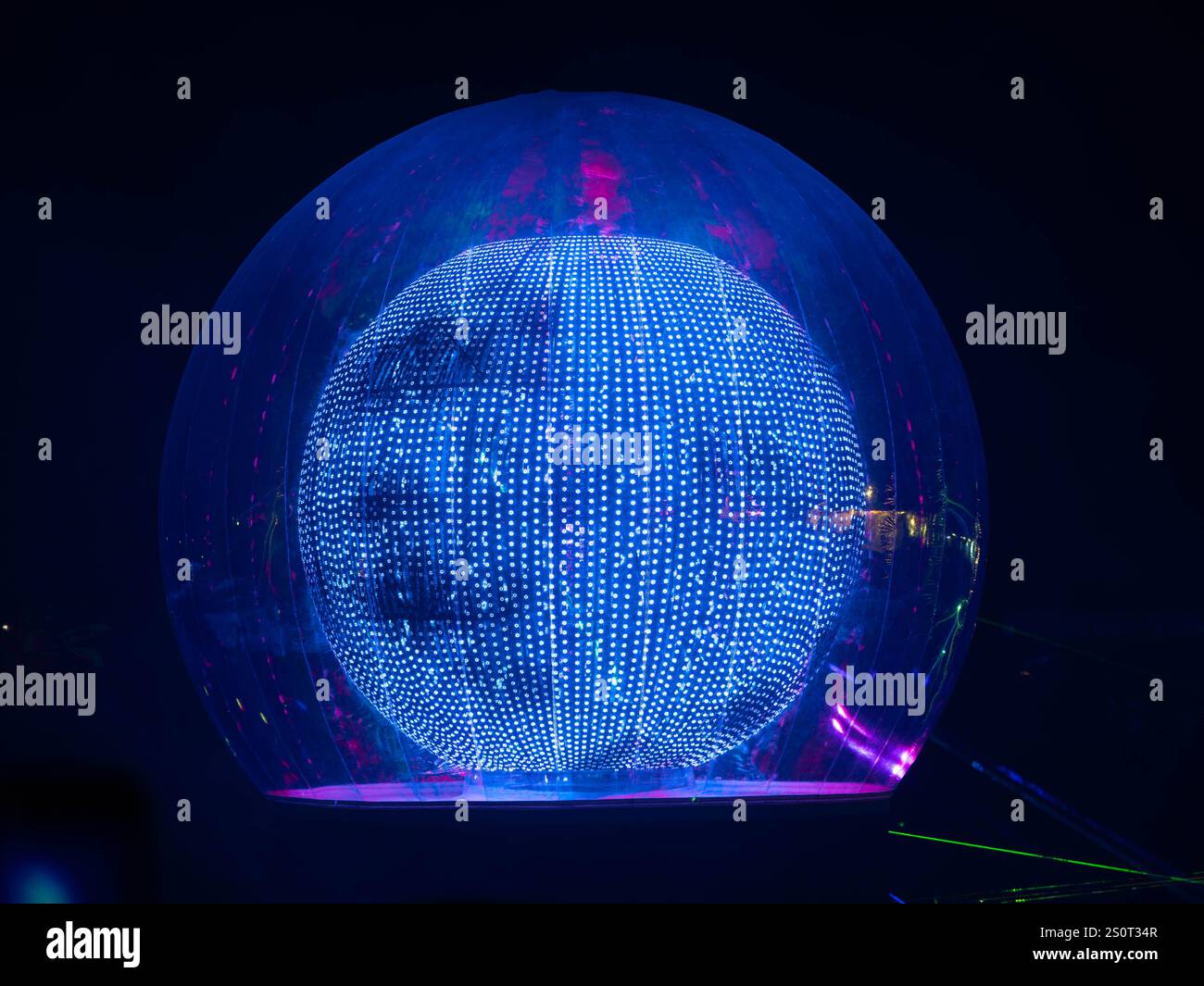 Light and sound show in a large crystal ball at the ASEAN Flower ...