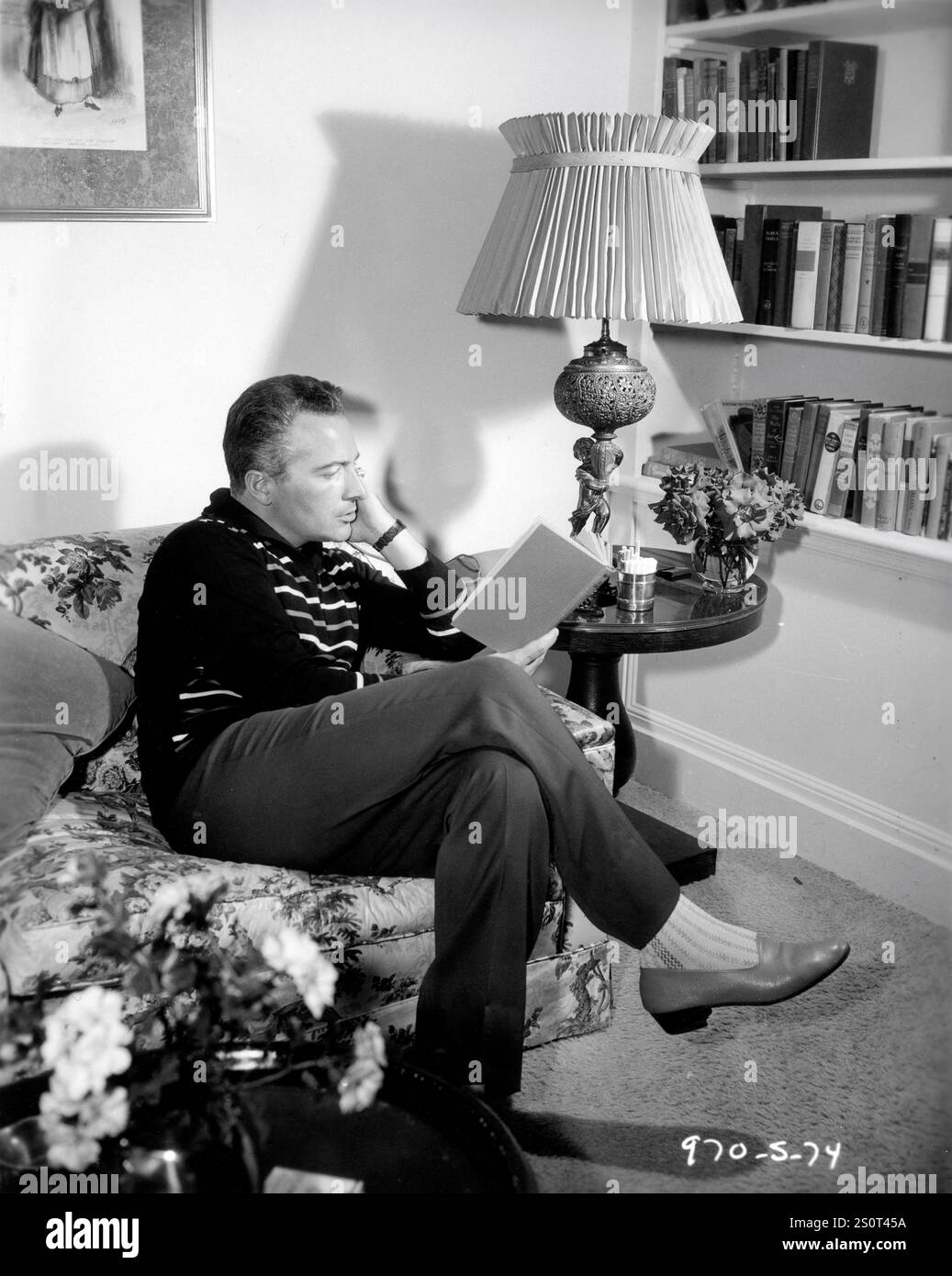 ROSSANO BRAZZI reading at home in 1958 publicity for Twentieth Century ...