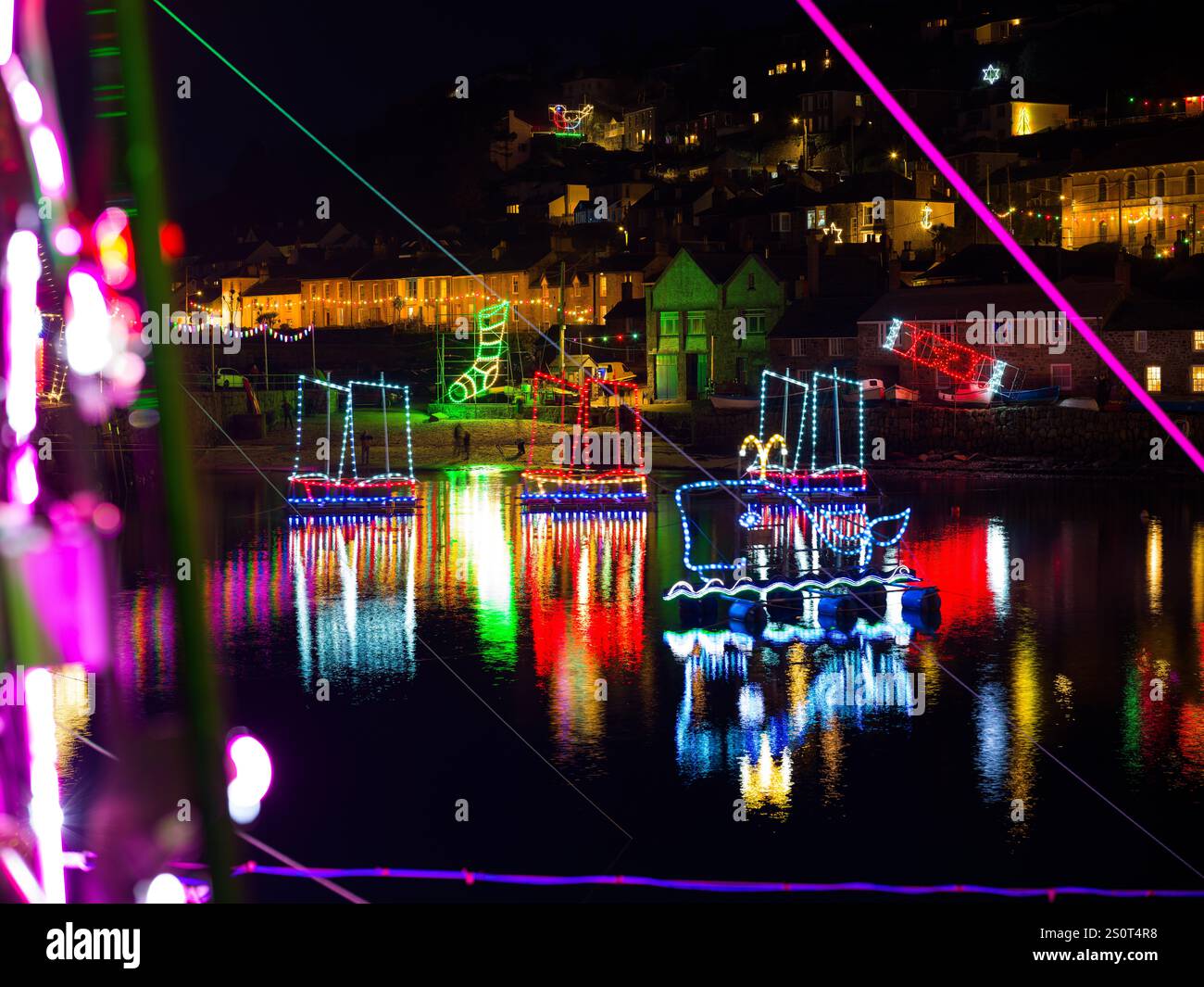 Mousehole Harbour Christmas Lights 2024 Stock Photo - Alamy