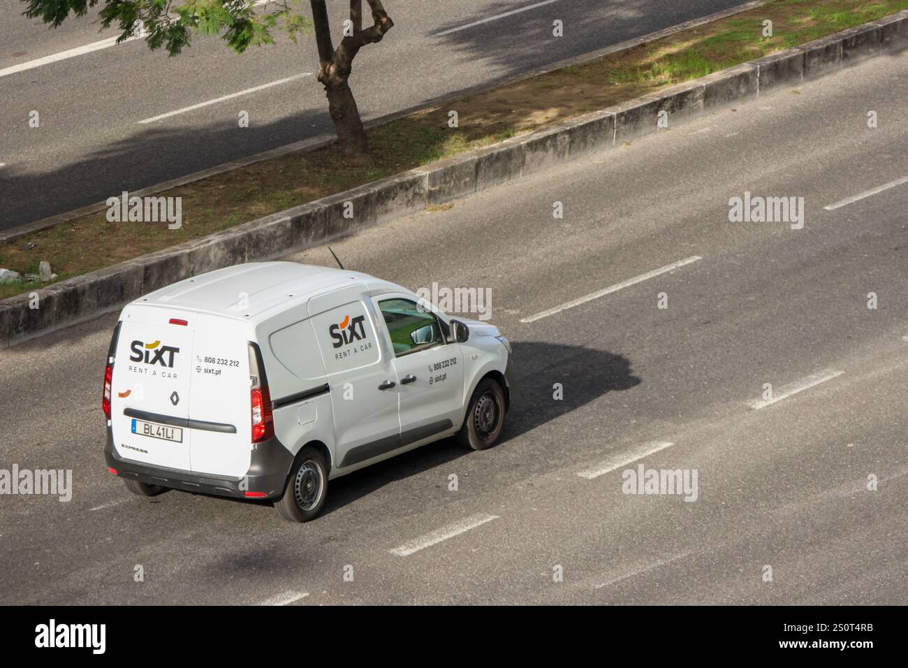 White sixt rental van driving on a multi lane highway Stock Photo - Alamy