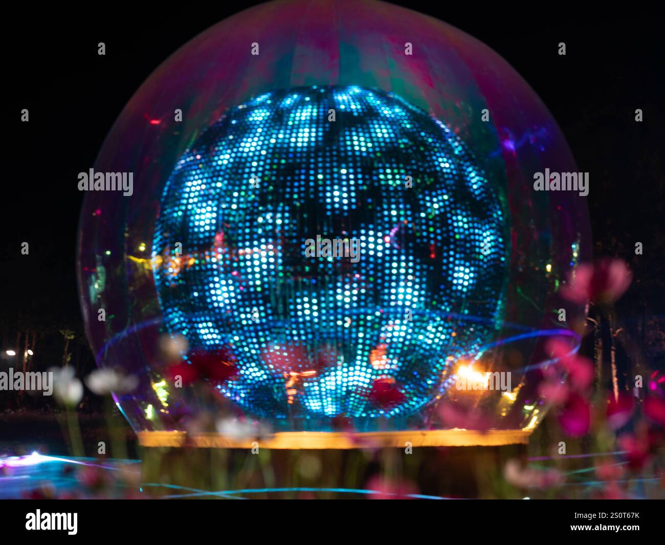 Light and sound show in a large crystal ball at the ASEAN Flower ...