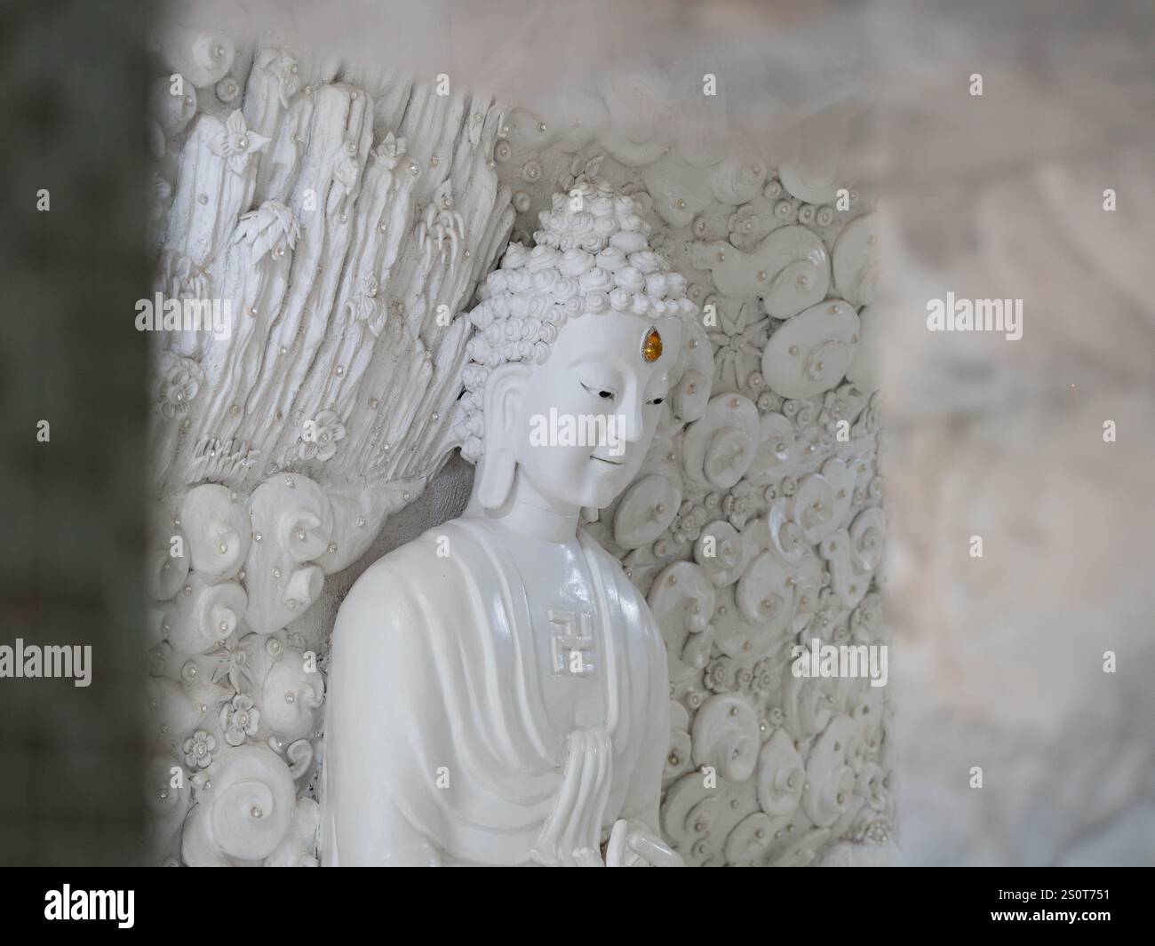 Marble sculpture symbolizing Buddhism in Asia inside a temple in ...