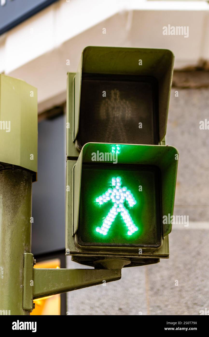 Green traffic light on a pole Stock Photo - Alamy