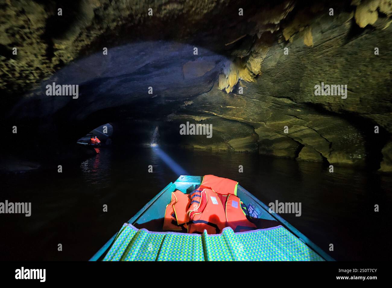 Boating through Caves at Thung Nham Bird Park, Vietnam Stock Photo - Alamy