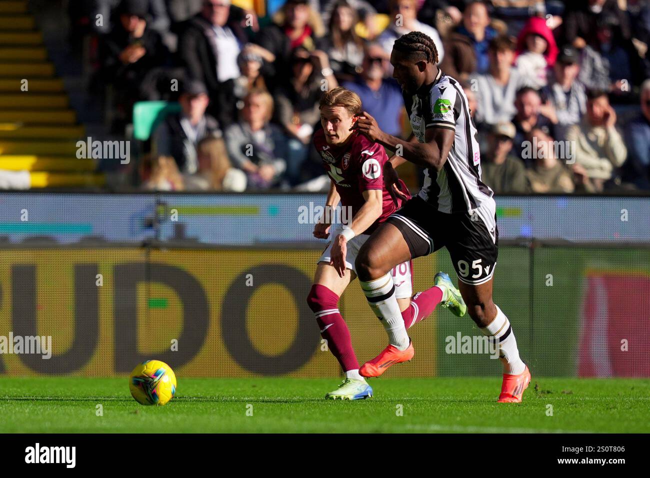 Torino's Marcus Pedersen and Udinese's Isaak Toure, right, in action ...