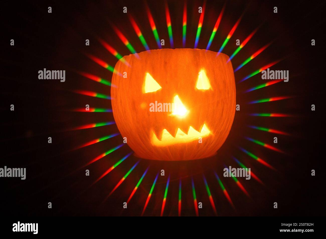 Pumpkin Head Lit up with Candle Light and Starburst Filter Stock Photo ...