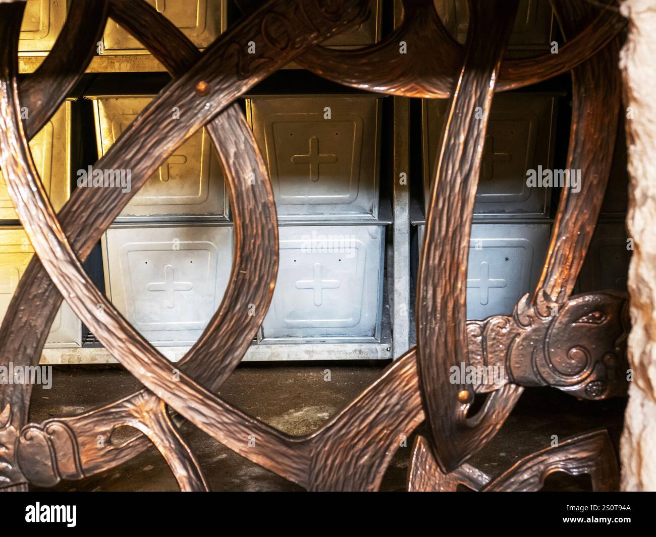 Boxs of ancient bones in the ossiary, in the crypt at St Aiden's Church ...