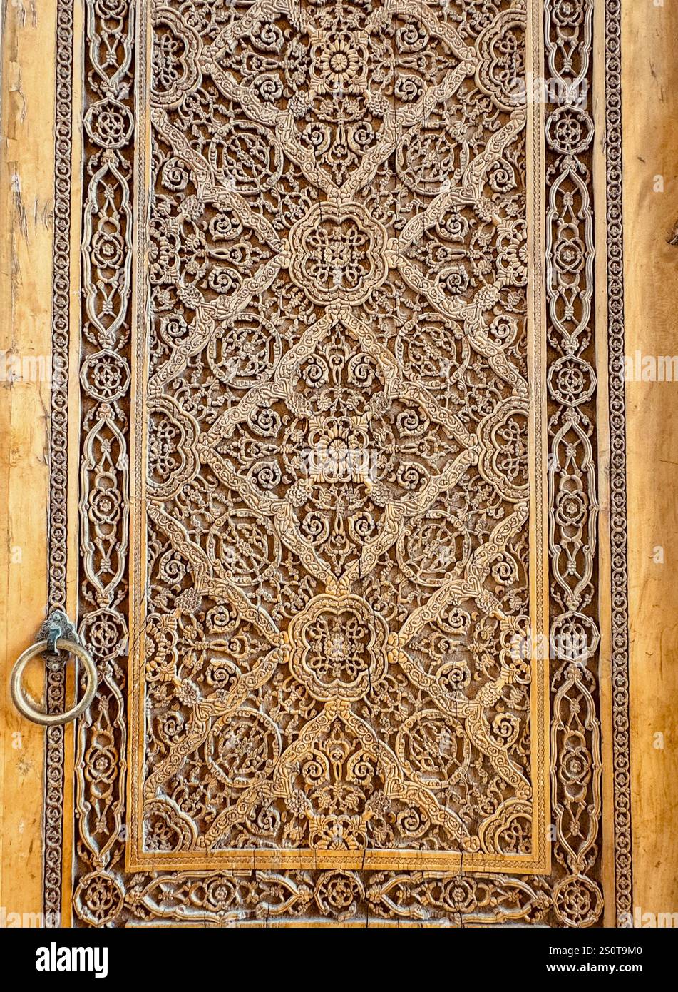 Intricate Hand-Carved Wooden Door with Ornamental Islamic Patterns ...