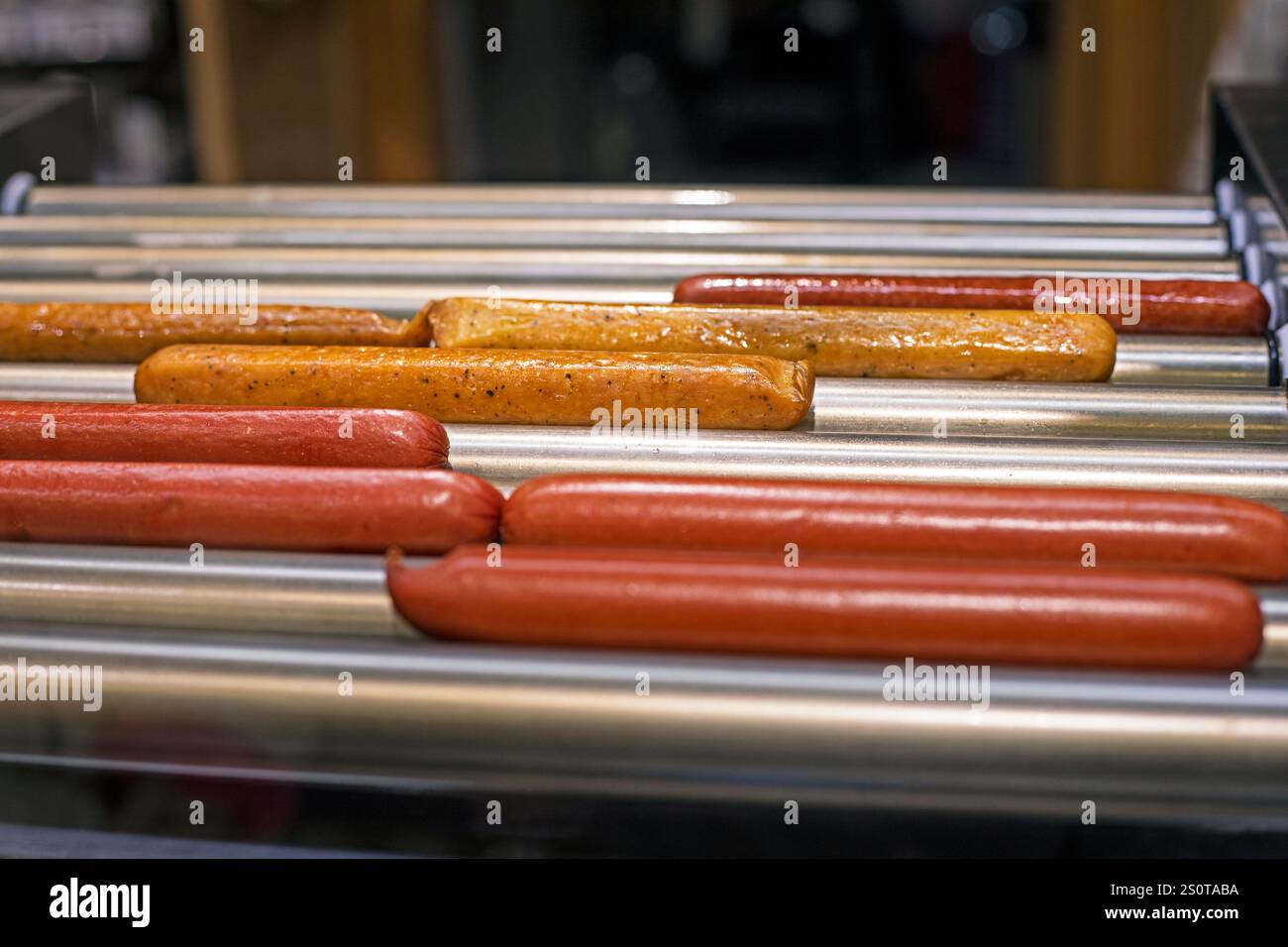 cooking hotdog sausages at a gas station. Quick snack Stock Photo - Alamy