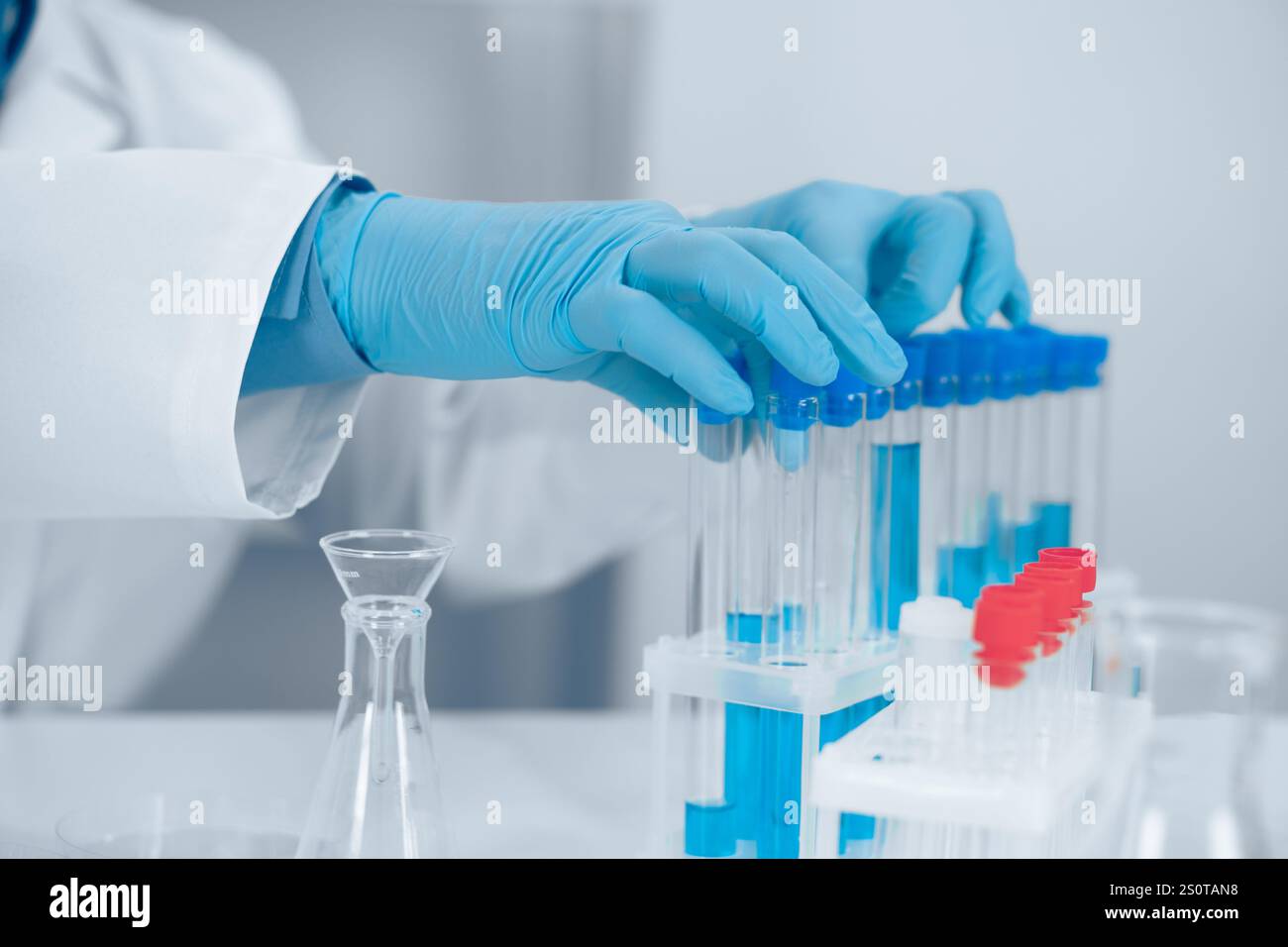 Scientist conducting experiment various lab hi-res stock photography ...