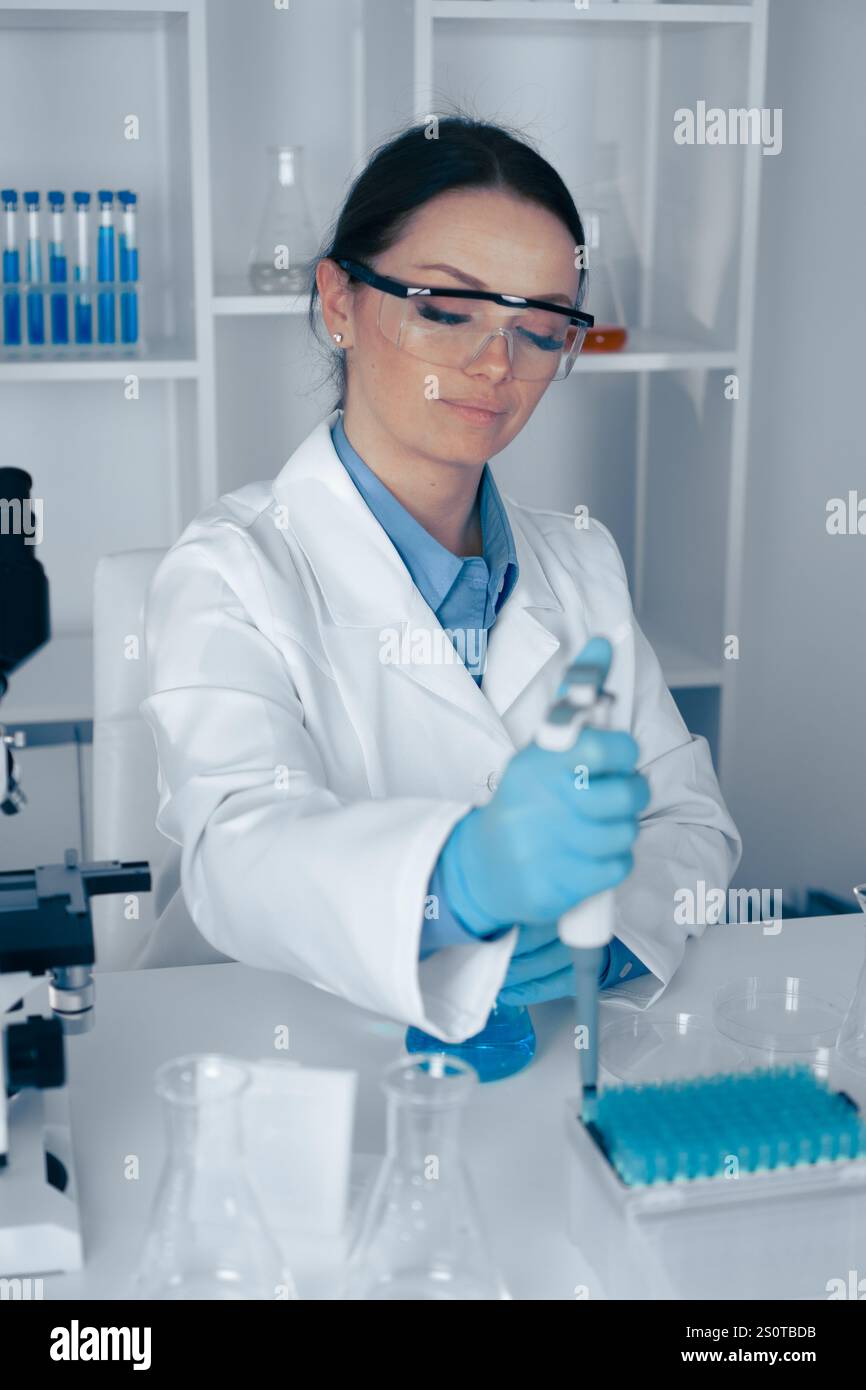 A dedicated female scientist is diligently conducting precise research ...