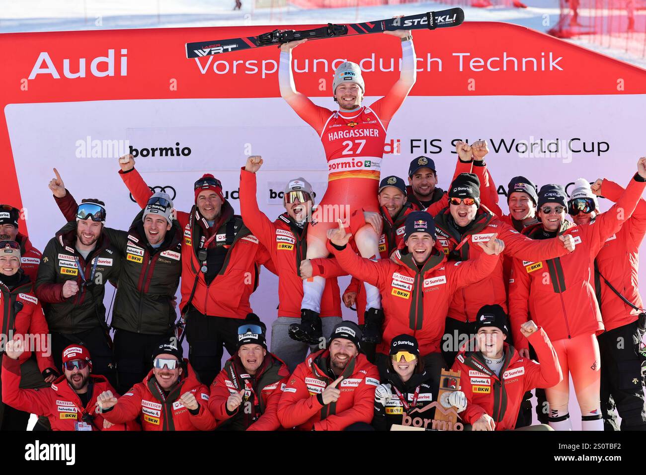 Third placed Switzerland's Alexis Monney celebrates with the team after ...