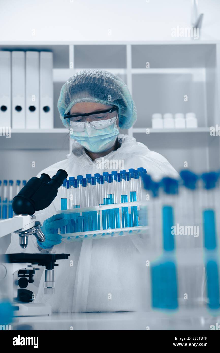 A scientist is diligently analyzing various samples in a cuttingedge ...