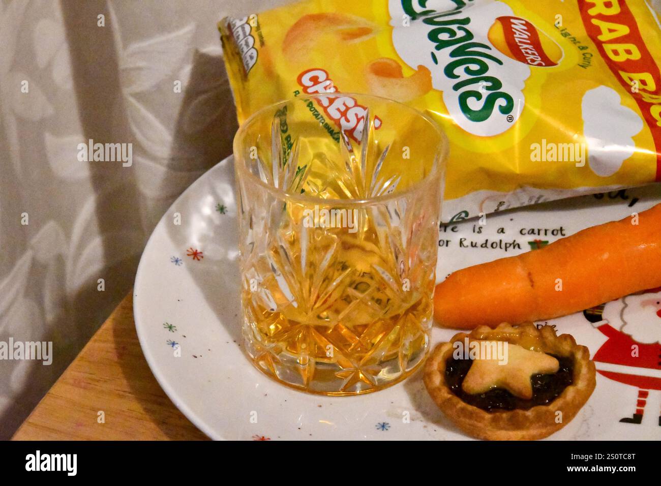 Box of eggs with a whiskplate of treats left out hi-res stock ...