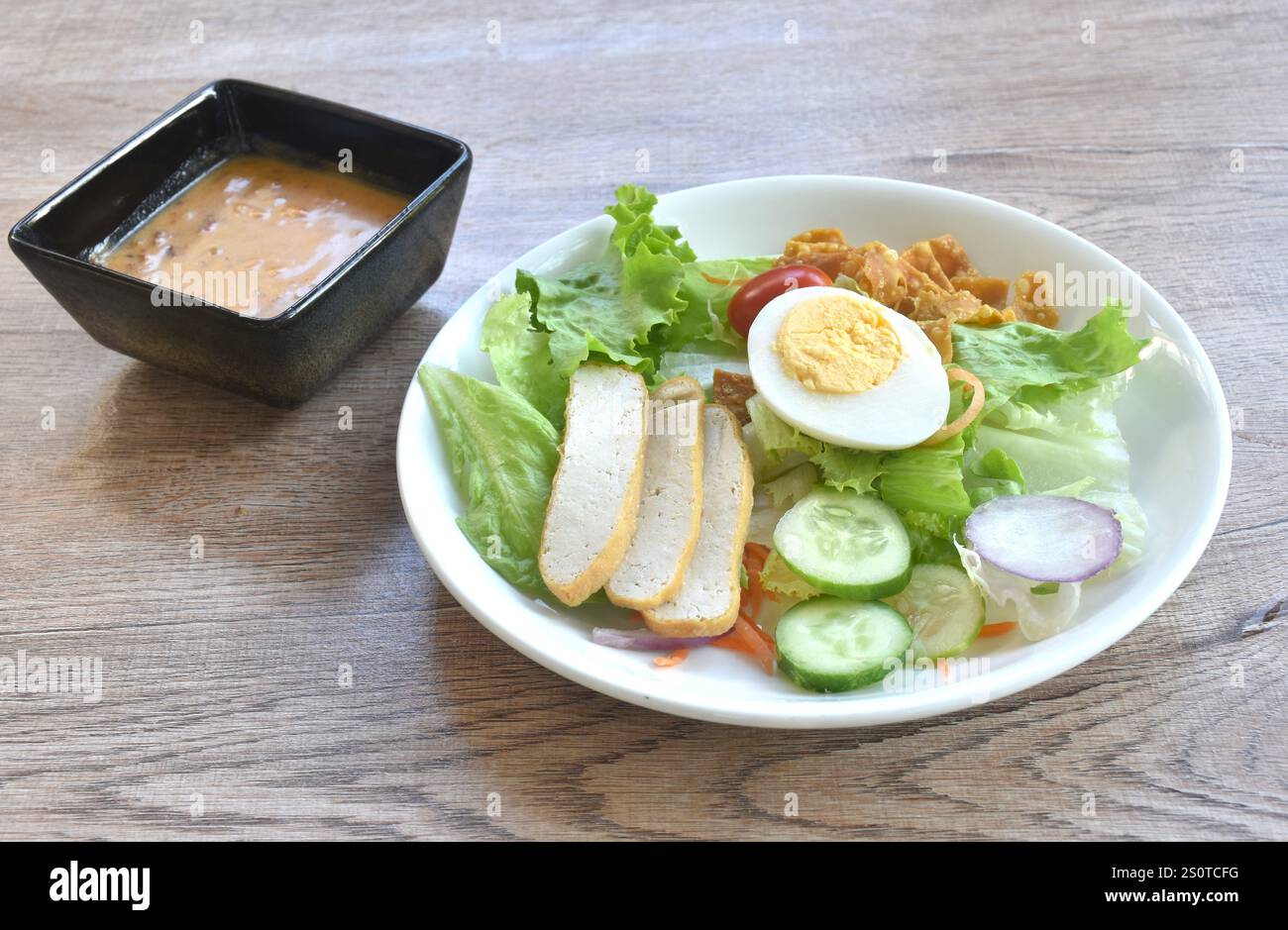 fresh vegetable topping boiled egg topping crispy fried taro dressing ...