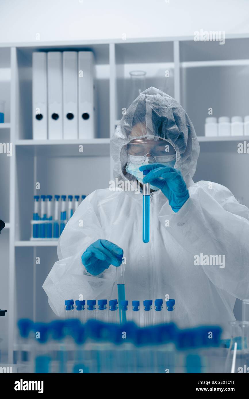 Scientist conducting experiment various lab hi-res stock photography ...