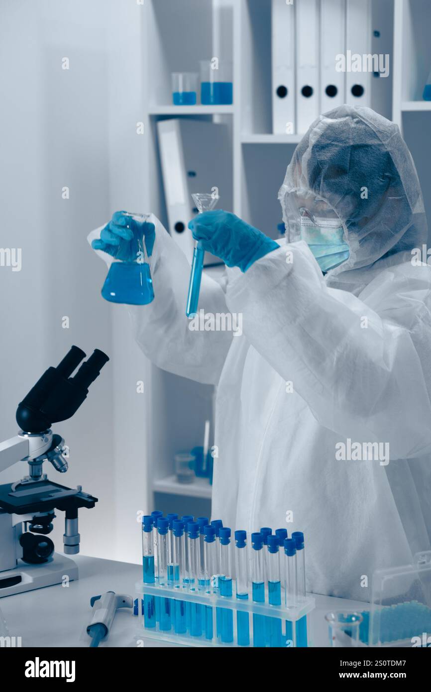 A dedicated scientist conducts detailed experiments in a fully equipped ...