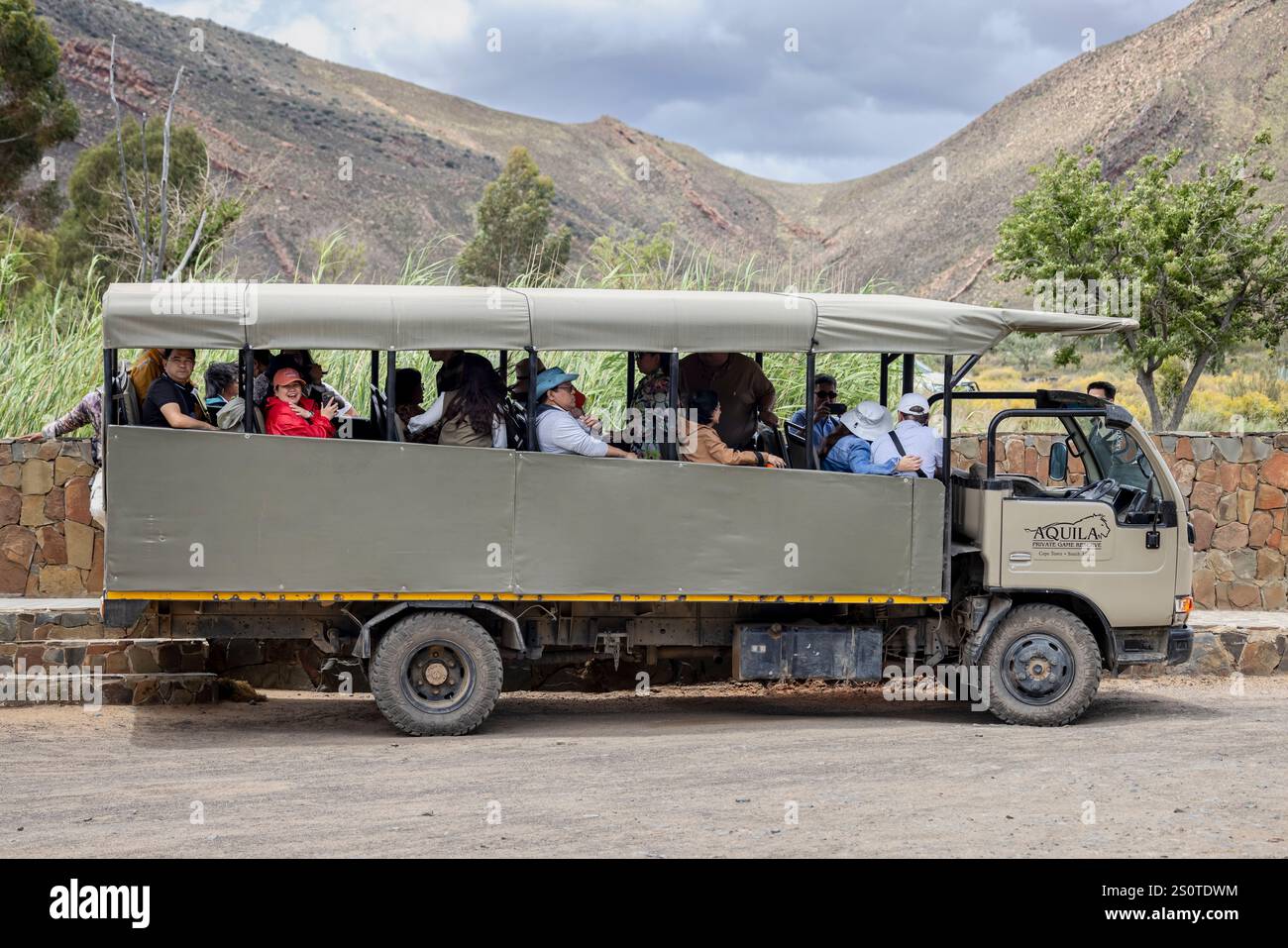 Large safari truck prparing to take tourists out on a game drive at ...