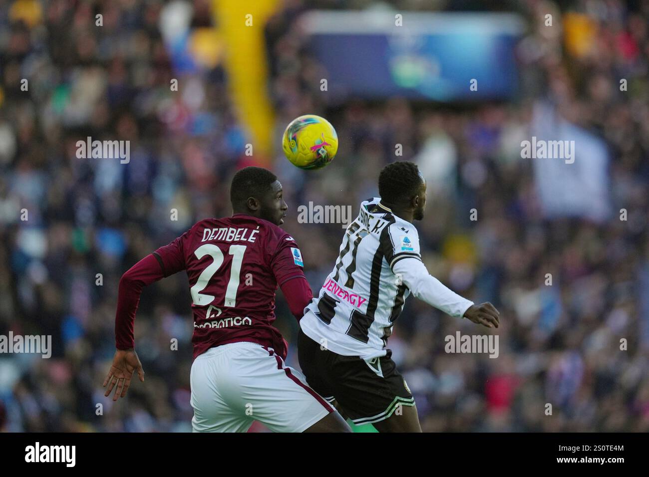 Torino's Ali Dembele, left, and Udinese's Hassane Kamara in action ...