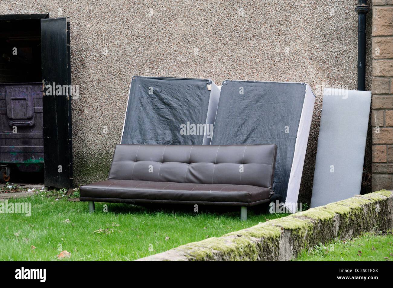 Fly tipping of waste and old wooden doors Stock Photo - Alamy