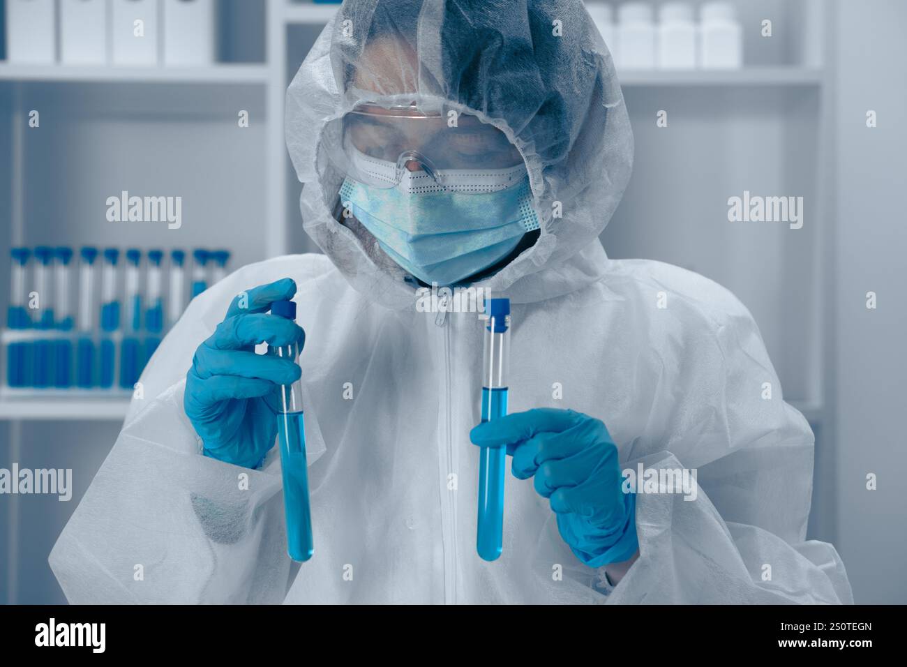 A skilled scientist conducts a precise experiment with test tubes in a ...